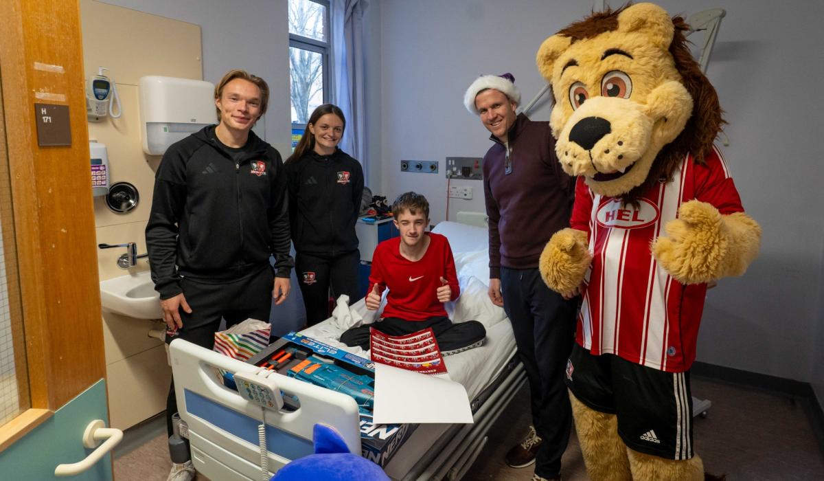 Exeter City FC players bring Christmas cheer to young patients at Royal Devon Hospital
